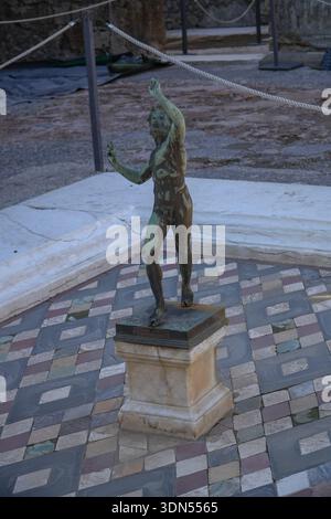 Bronze statue of the Dancing Faun (Fauno danzante) in the House of the ...