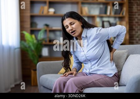 Young adult woman experiencing acute tooth pain and sensitivity ...