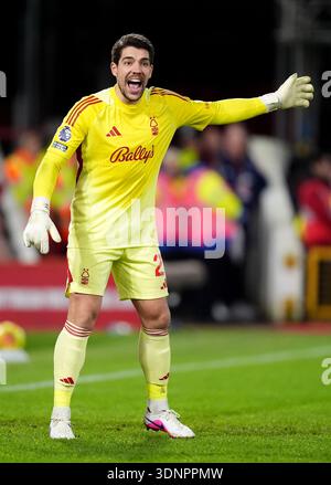 Nottingham Forest goalkeeper Stefan Ortega punches the ball clear ...