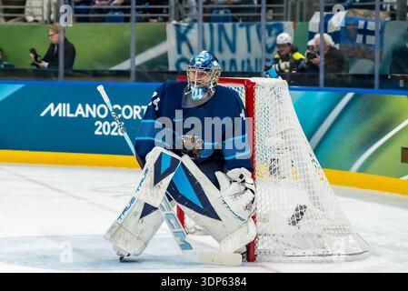 Finland goalkeeper Juuse Saros (74) blocks a shot by Slovakia's Matus ...