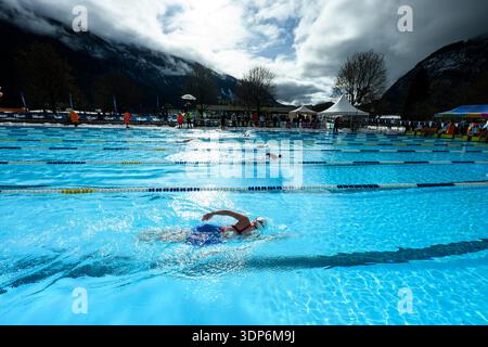 Swimmers compete during an international winter swimming competition in ...