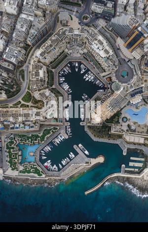 Aerial view of the Mediterranean Sea framed by blooming pink roses on ...