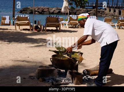 Chief cooking on beach for Independence Day at Sandals , Grenada on ...