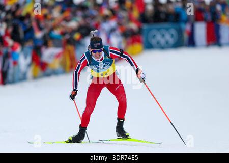 Sturla Holm Laegreid, of Norway, competes in the men's 15-kilometer ...