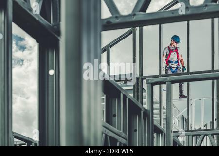 A worker walks at a construction site on a highway in Frankfurt ...