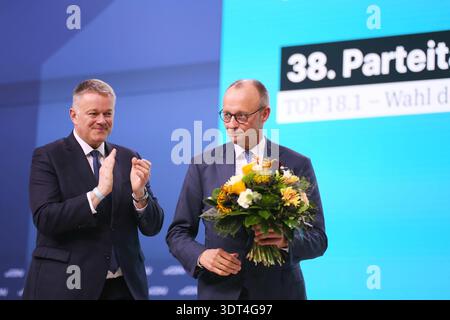 Germany's Chancellor Friedrich Merz, left, shakes hands with Kenya's ...
