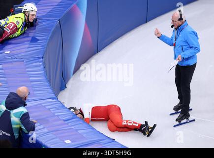 Kamila Sellier of Poland falls during a short track speed skating women ...