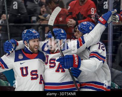 United States' Jaccob Slavin (74) poses with his gold medal after the ...