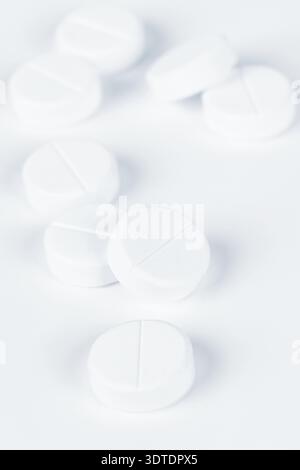 several colored medicine pills on white background Stock Photo - Alamy