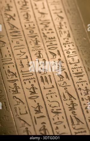 Ancient egyptian hieroglyphs carved on sand stone at the Grand Egyptian ...