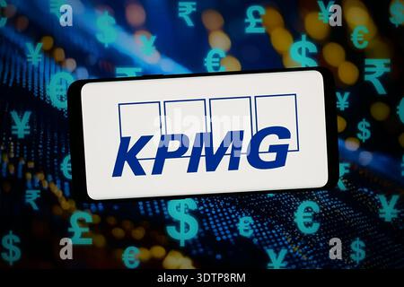 In this photo illustration, the logo of consulting company KPMG ...