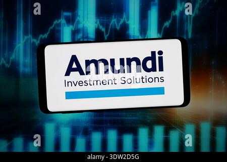 In this photo illustration, the Amundi logo is displayed on the screen ...