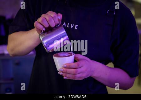 RIGA, LATVIA. 24th February 2026. A barista at Kalve Coffee Roastery ...