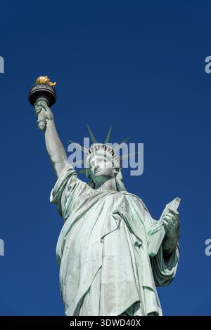 The iconic Statue of Liberty on Liberty Island. The copper clad statue ...