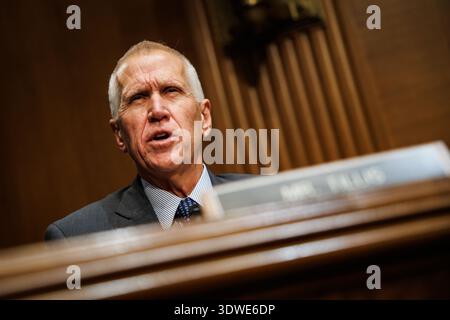 Sen. Thom Tillis (R-N.C.) speaks with reporters as he departs a Senate ...