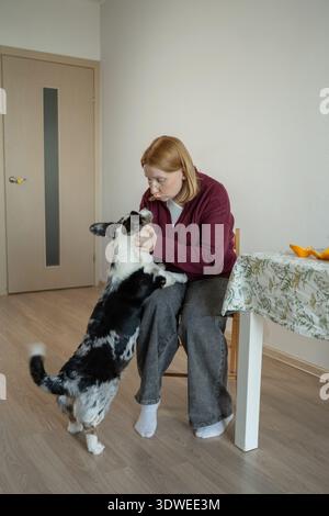 A pregnant woman in a cozy home atmosphere. Waiting for a child in the ...