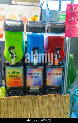 Colorful Frozen Slush Drinks in Plastic Cups Isolated on White ...