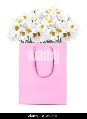 Beautiful chamomile flowers in bag indoors, closeup Stock Photo - Alamy