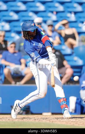 second baseman Otto Lopez #6 of the Miami Marlins bunts the ball in the ...