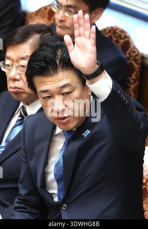 Japanese Chief Cabinet Secretary Minoru Kihara bows after the House of ...