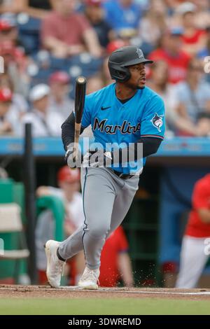 Miami Marlins second baseman Bryson Brigman (90) throws to first base ...