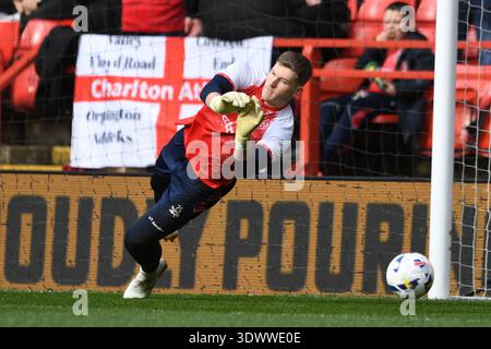 London, England. 28th Feb 2026. Sonny Carey is challenged by George ...