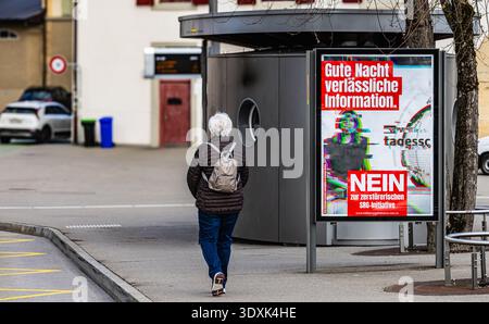 A pedestrian walks past a poster against the upcoming G7 summit on a ...
