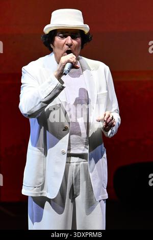 Italian singer-songwriter Renato Zero, performs during the L'ORAZERO IN ...