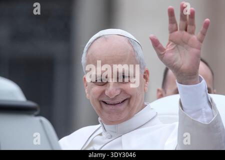 Pope Leo XIV waves as he arrives for his weekly general audience in St ...