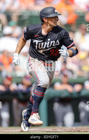 Minnesota Twins third baseman Brooks Lee makes the off balance throw on ...
