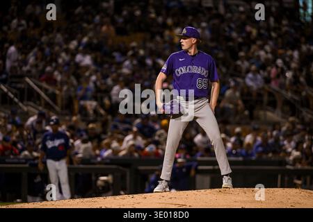 Colorado Rockies pitcher Sean Sullivan (45) delivers to a Chicago Cubs ...