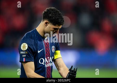 Achraf Hakimi of Paris Saint-Germain kisses the trophy after the Paris ...