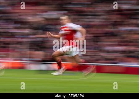Arsenal players run during a warm up before the Champions League final ...