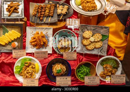 Realistic plastic models of food in the windows of a Japanese ...