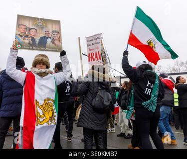Toronto, Ontario - February 14, 2026: Iranian diaspora rally with flags ...