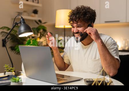 Arabian man at home records short video on smartphone speaks to camera ...