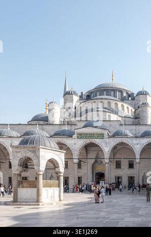 Magnificent golden dome with blue Islamic calligraphy bands crowns ...