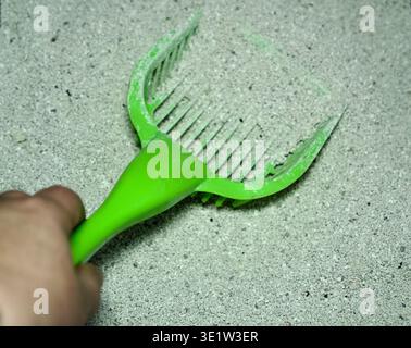 Hand Holding Green Cat Litter Pellets Stock Photo - Alamy