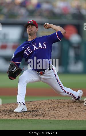 Texas Rangers pitcher MacKenzie Gore winds up to deliver to the ...