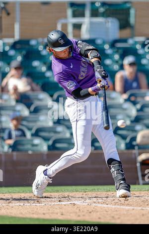 Colorado Rockies third baseman Kyle Karros makes a off-balance throw ...