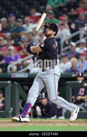 Cleveland Guardians third baseman Daniel Schneemann fields a ground ...
