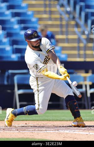 Milwaukee Brewers' Gary Sánchez hits an RBI single allowing Andrew ...