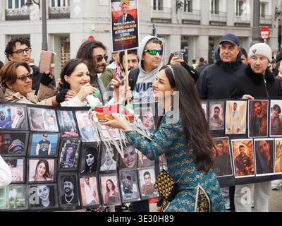 Members of the Iranian community in Madrid, waving Iranian flags ...