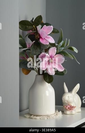 Easter flower arrangement with a cute ceramic bunny figurine colorful ...