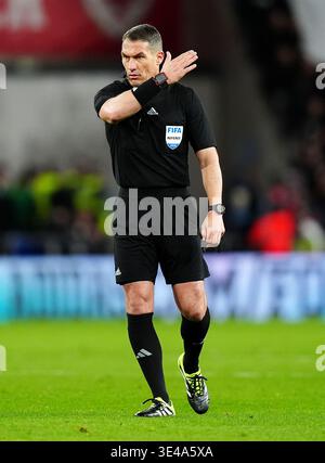 CARDIFF, WALES - MARCH 26: Referee István Kovács during the World Cup ...