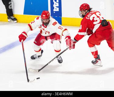 Denver forward Sam Harris (12) jumps into the glass to celebrate ...