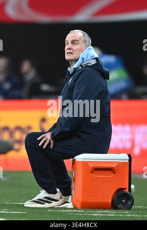 Uruguay head coach Marcelo Bielsa, center, speaks to his players during ...