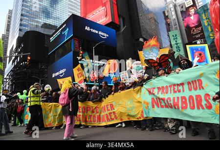 Thousands march down Times Square in Manhattan for the third â€˜No ...