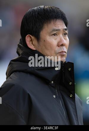 Japan head coach Hajime Moriyasu walks in the pitch ahead of his World ...