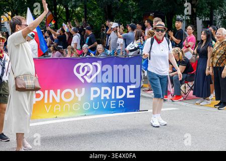 Parade participants wave flags at spectators during the Israel Day ...